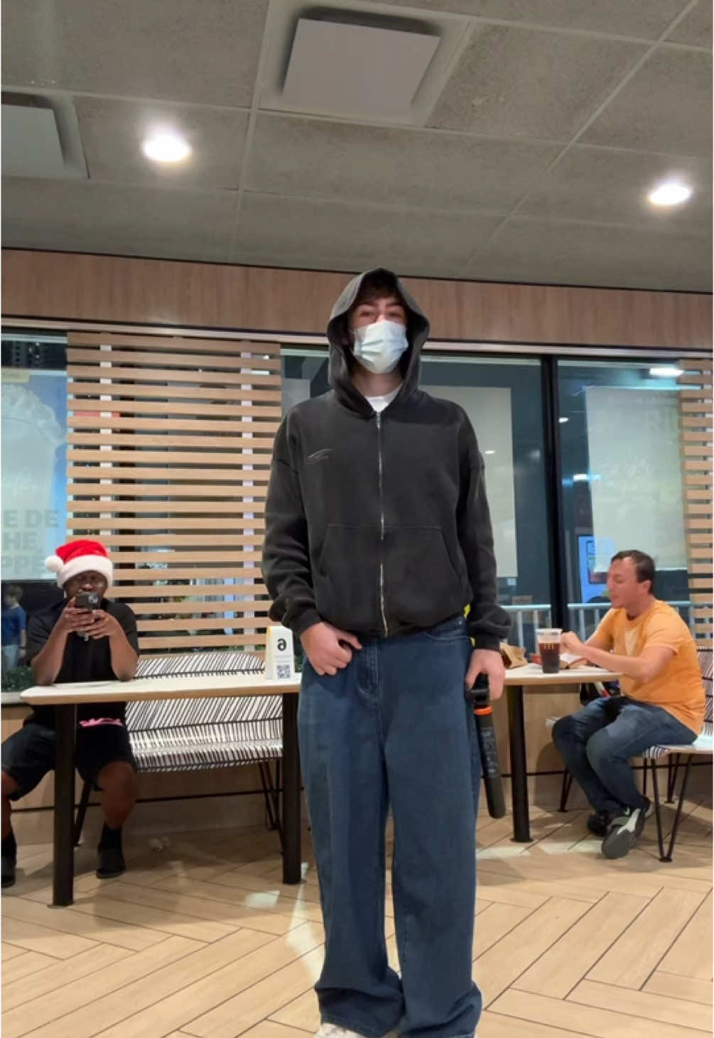 Luigi Mangione moments before his arrest | Max Evasion (@maxevasi0n)