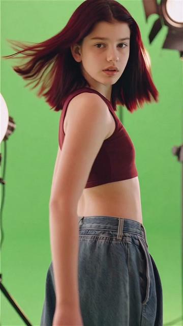 Bold red hair, burgundy crop top, and | Models (@prolezviee)